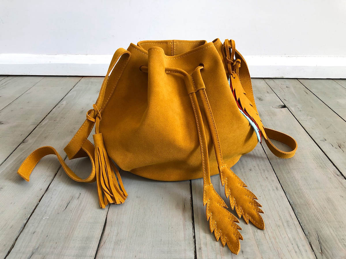 Mustard bucket bag store